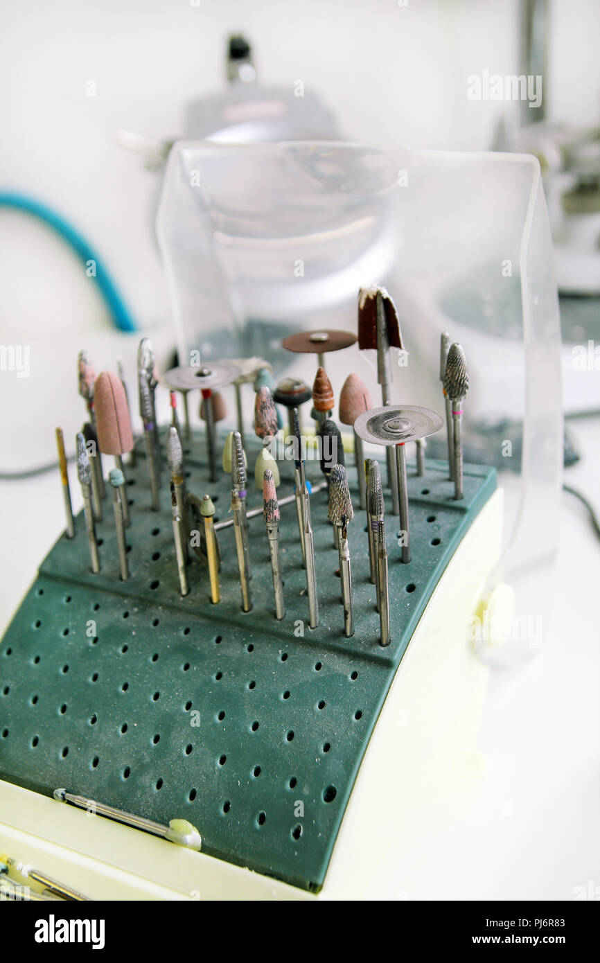 Different dental tools and burs. Dentures and dentistry. Dental ...