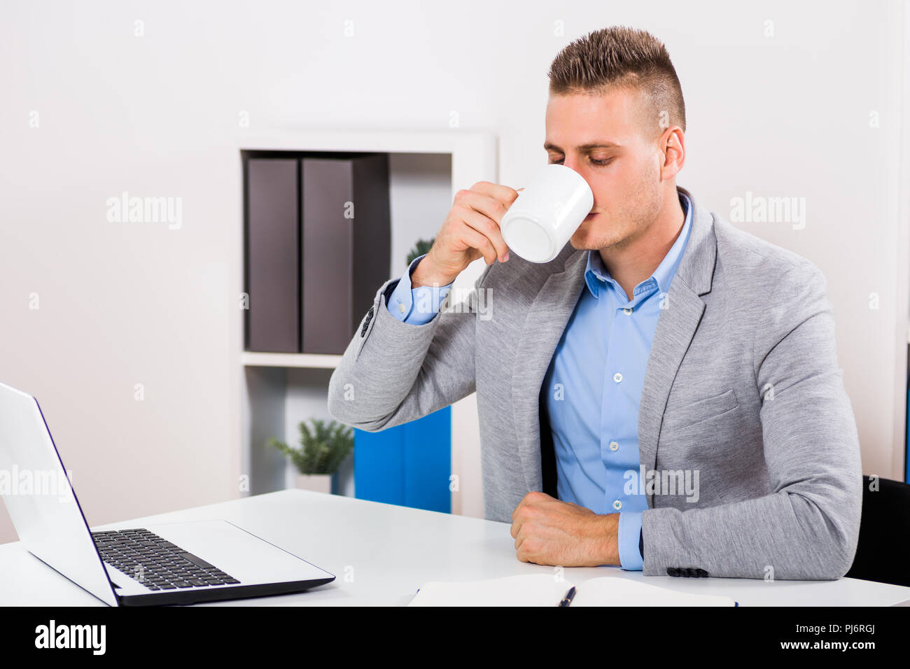Manual worker drinking coffee hi-res stock photography and images - Alamy