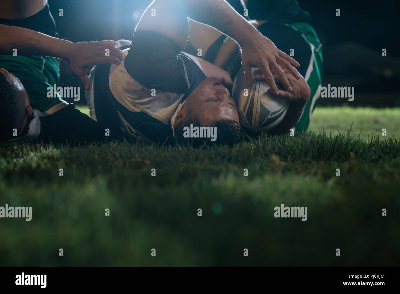 Professional sportsperson playing competition sport stadium defending ...