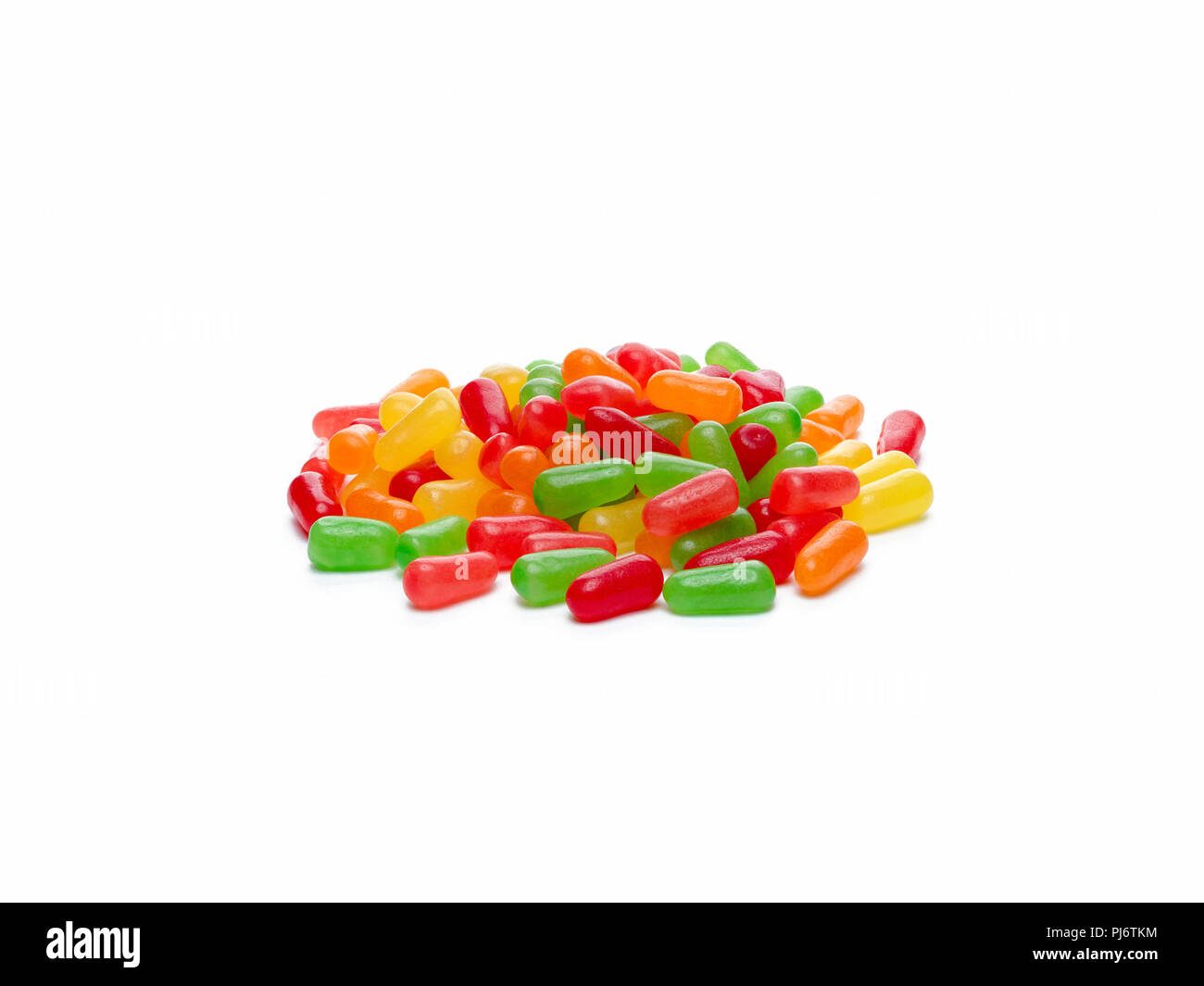 Isolated pile of colorful pill shaped fruit flavored candy Stock Photo ...
