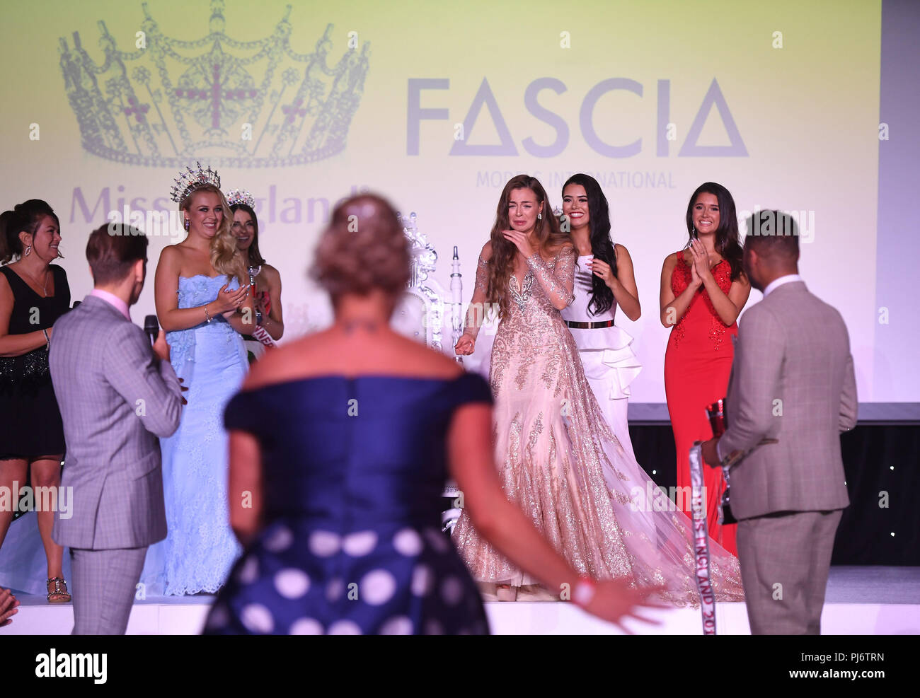 Amy may goes to hug her daughter miss newcastle hi-res stock ...