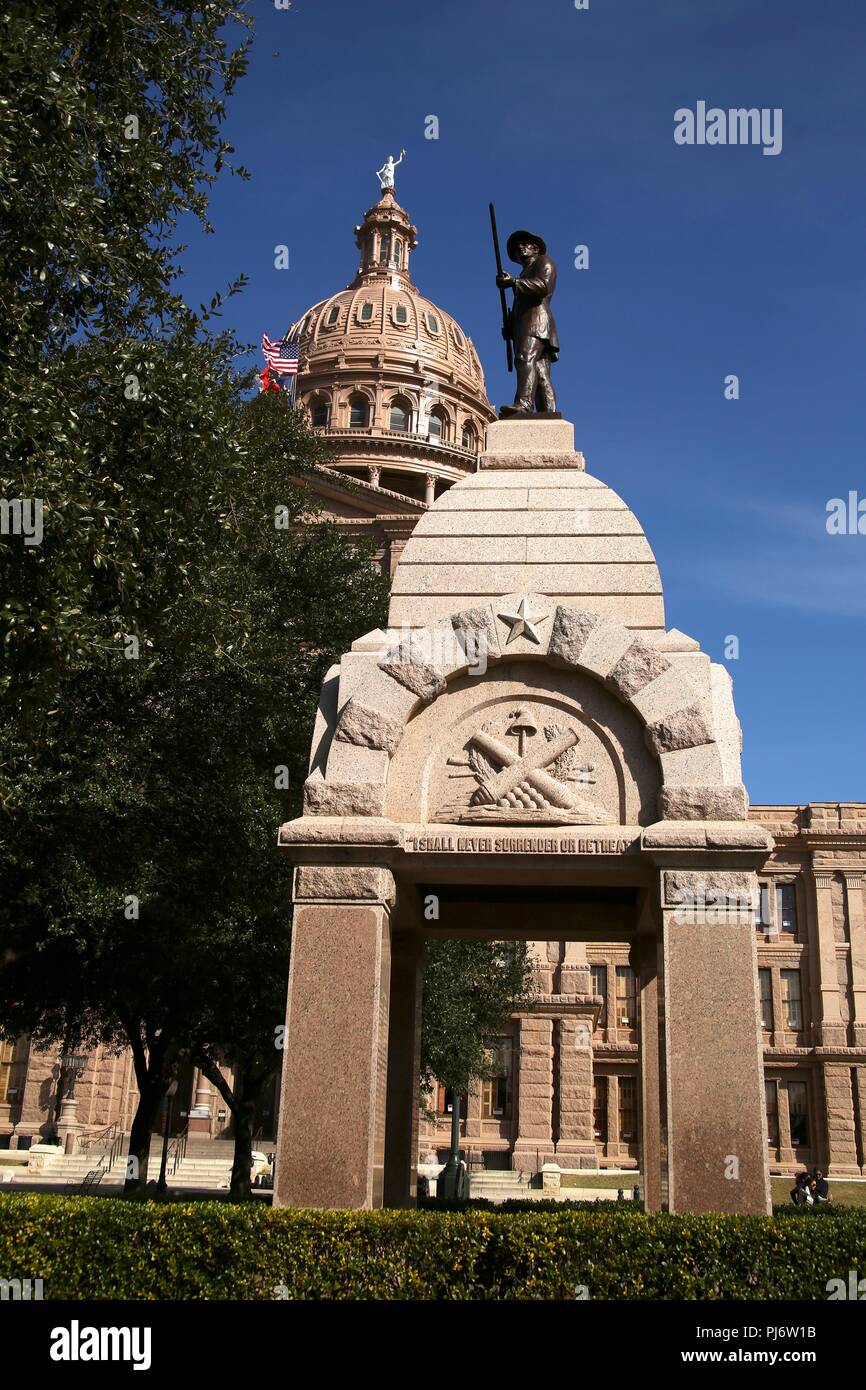 The Texas capitol building and dome with the Texas flag in Austin Texas ...