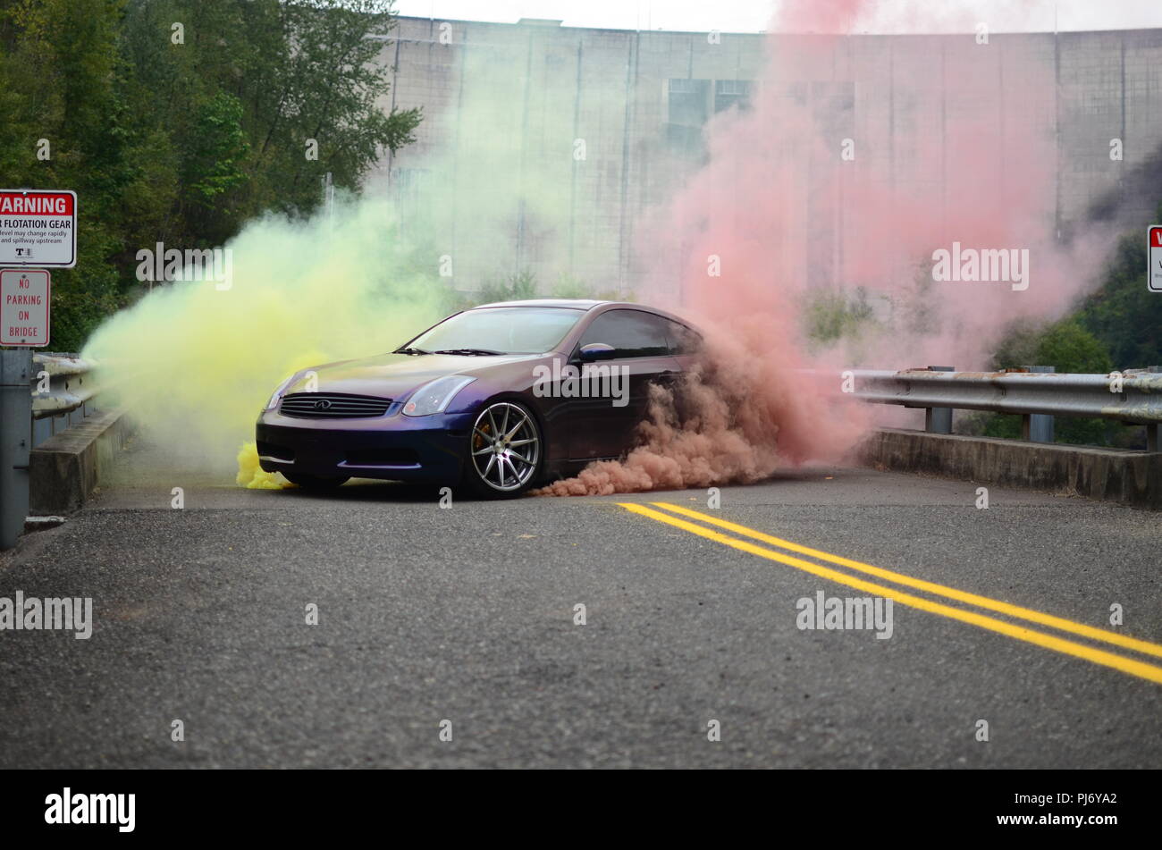 Car with smoke Stock Photo - Alamy