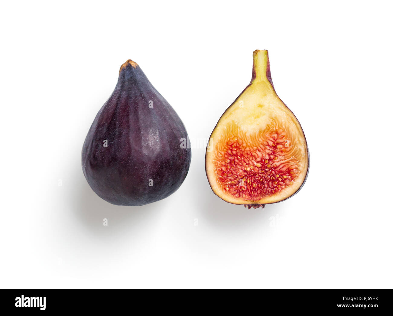 Creative layout made of figs. Half and whole fig isolated on white with ...