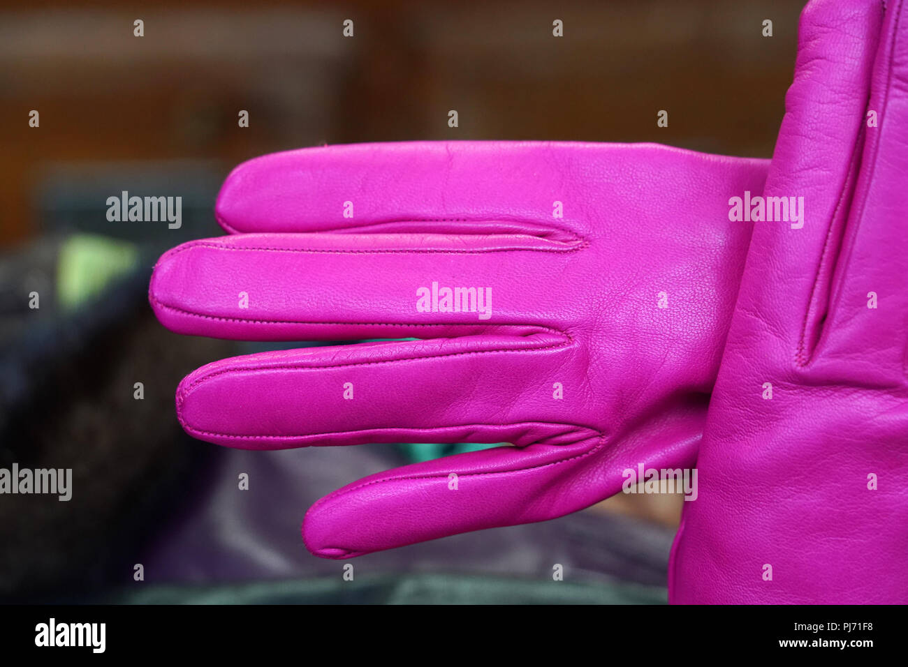 different colors leather gloves on display Stock Photo - Alamy