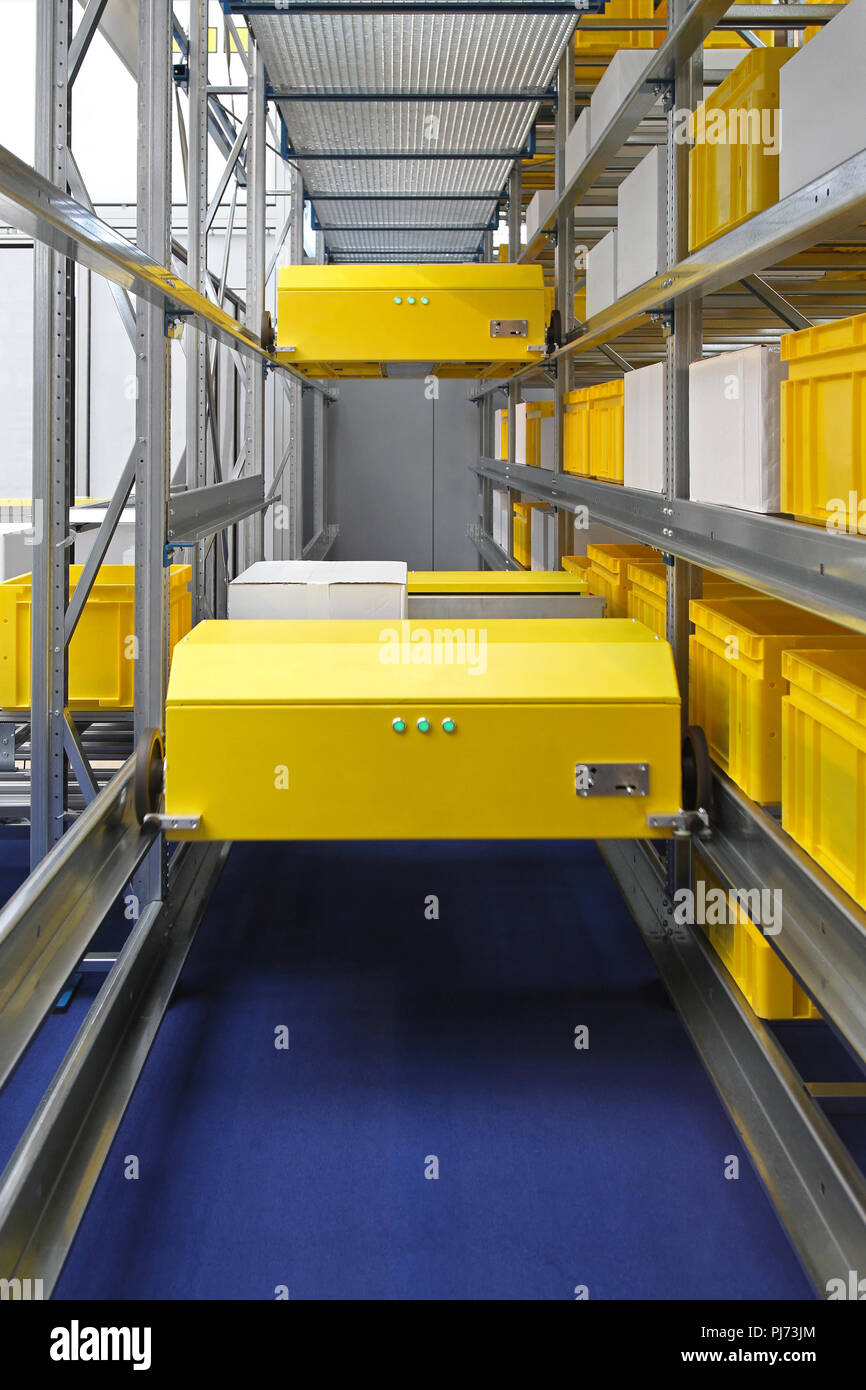 Automated tranport shuttle system in distribution warehouse Stock Photo ...