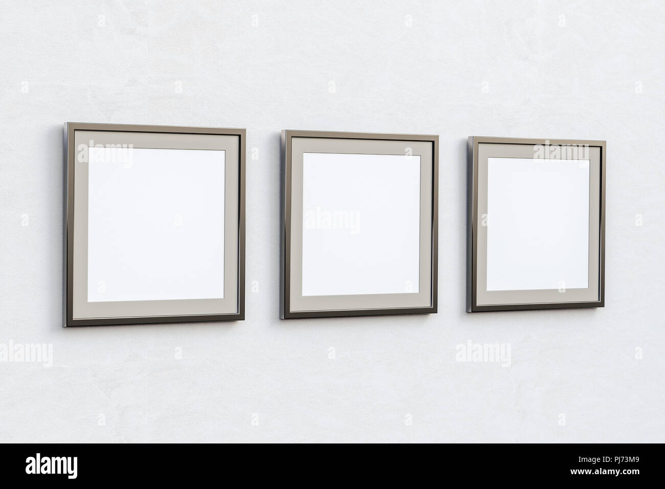Three square frames with blank poster mock up on white wall. Include ...