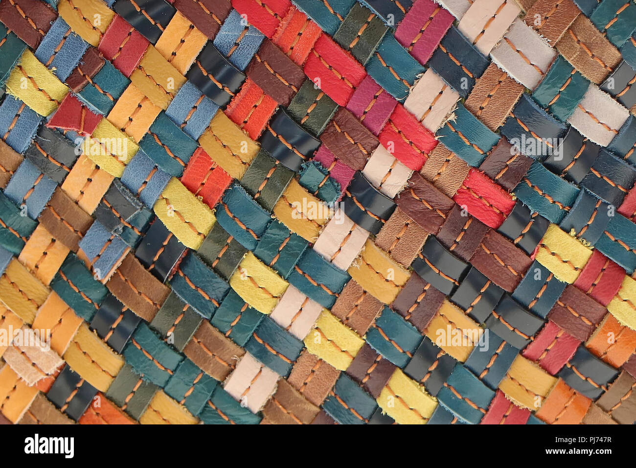 Colorful plaid pattern made from leather strips Stock Photo - Alamy