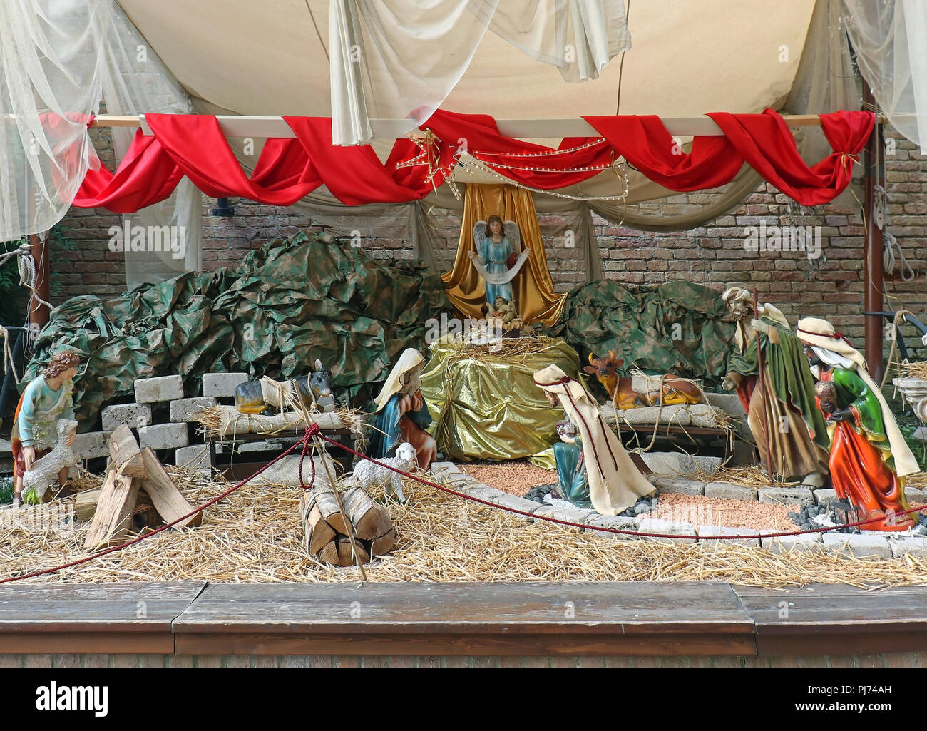 Birth of Jesus in native religious bible scene inside barn with ...