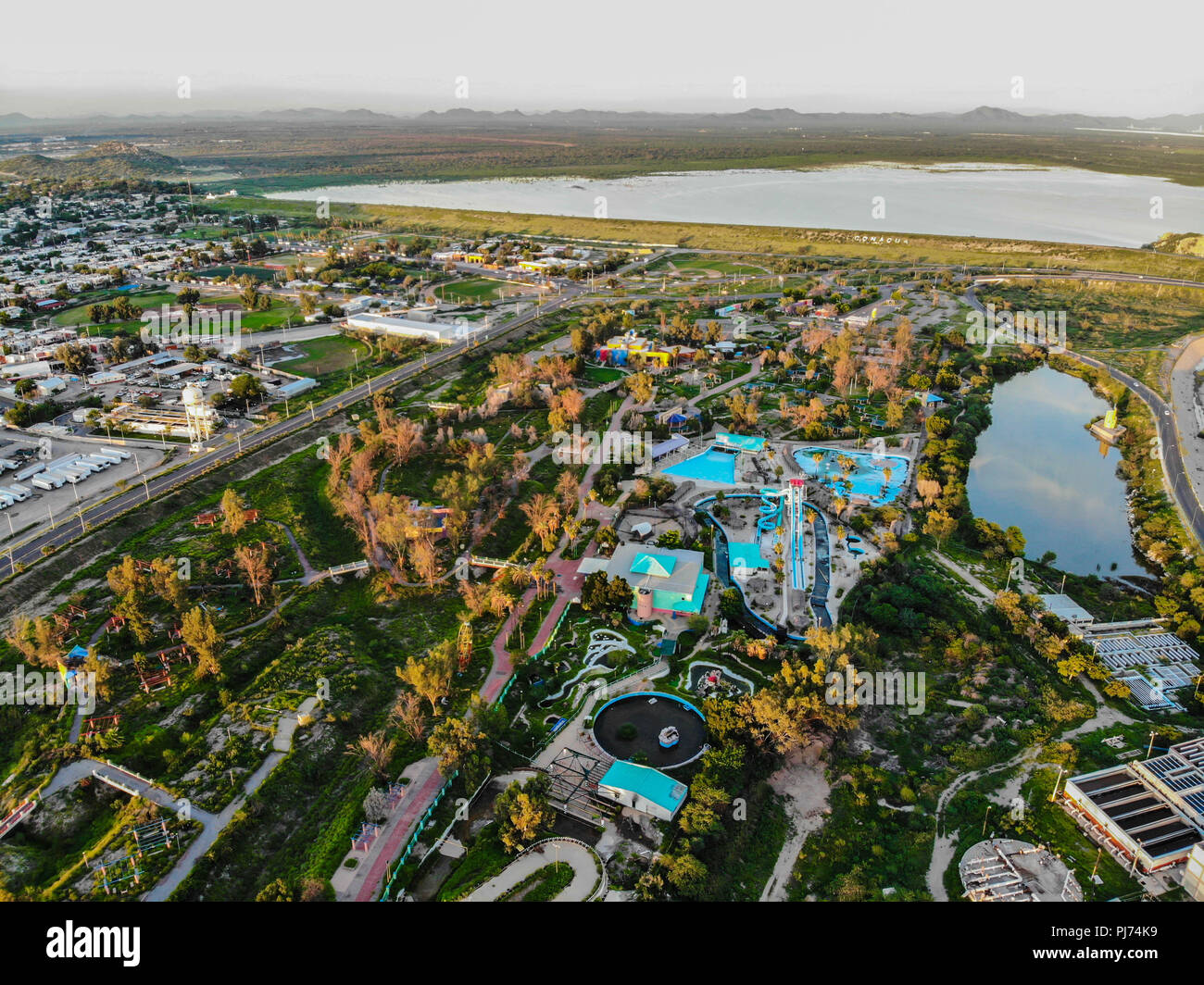 Aerial view of the Sauceda recreational park, water purification plant ...