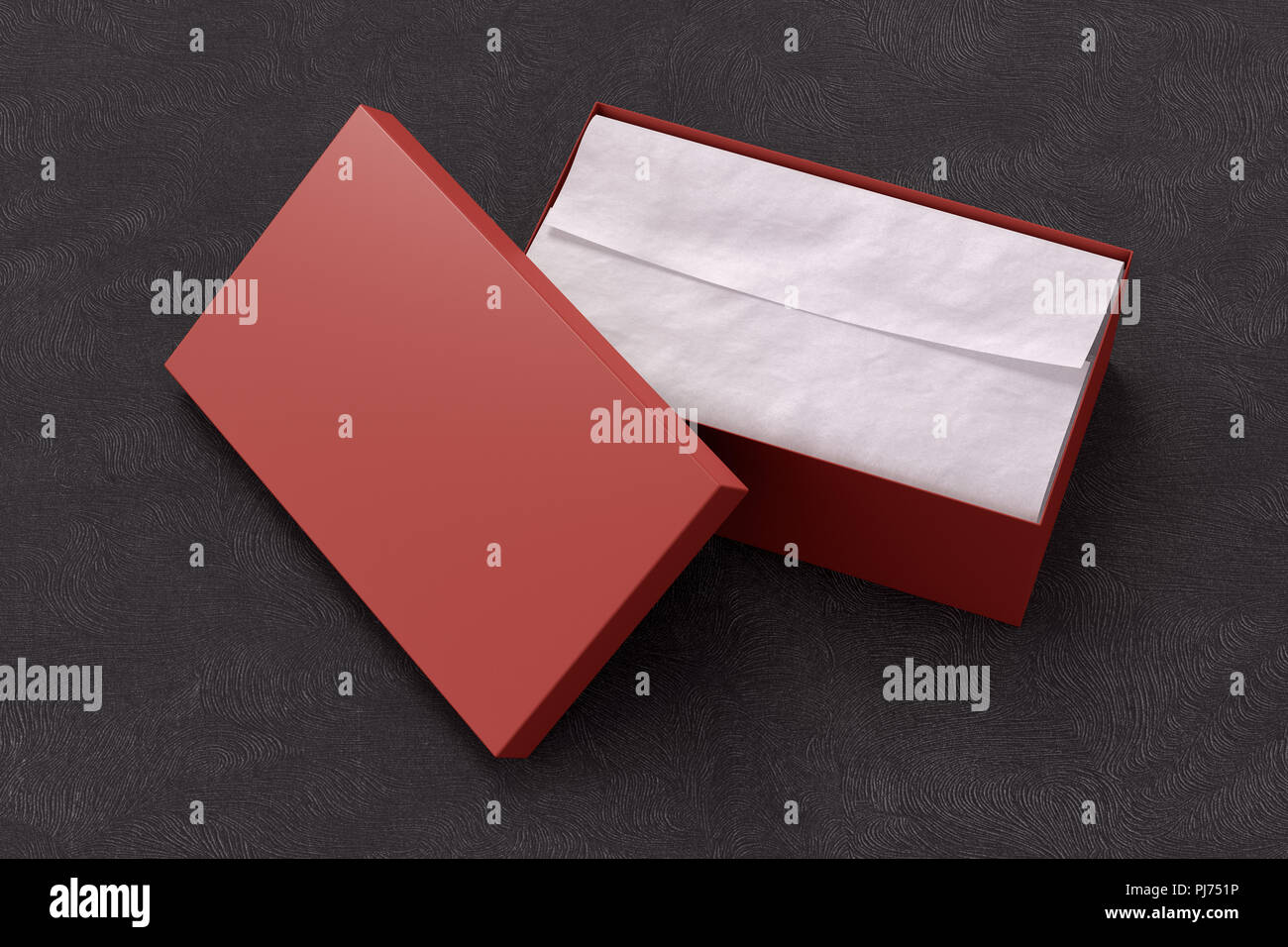 Red shoe box container on black background with wrapping paper ...