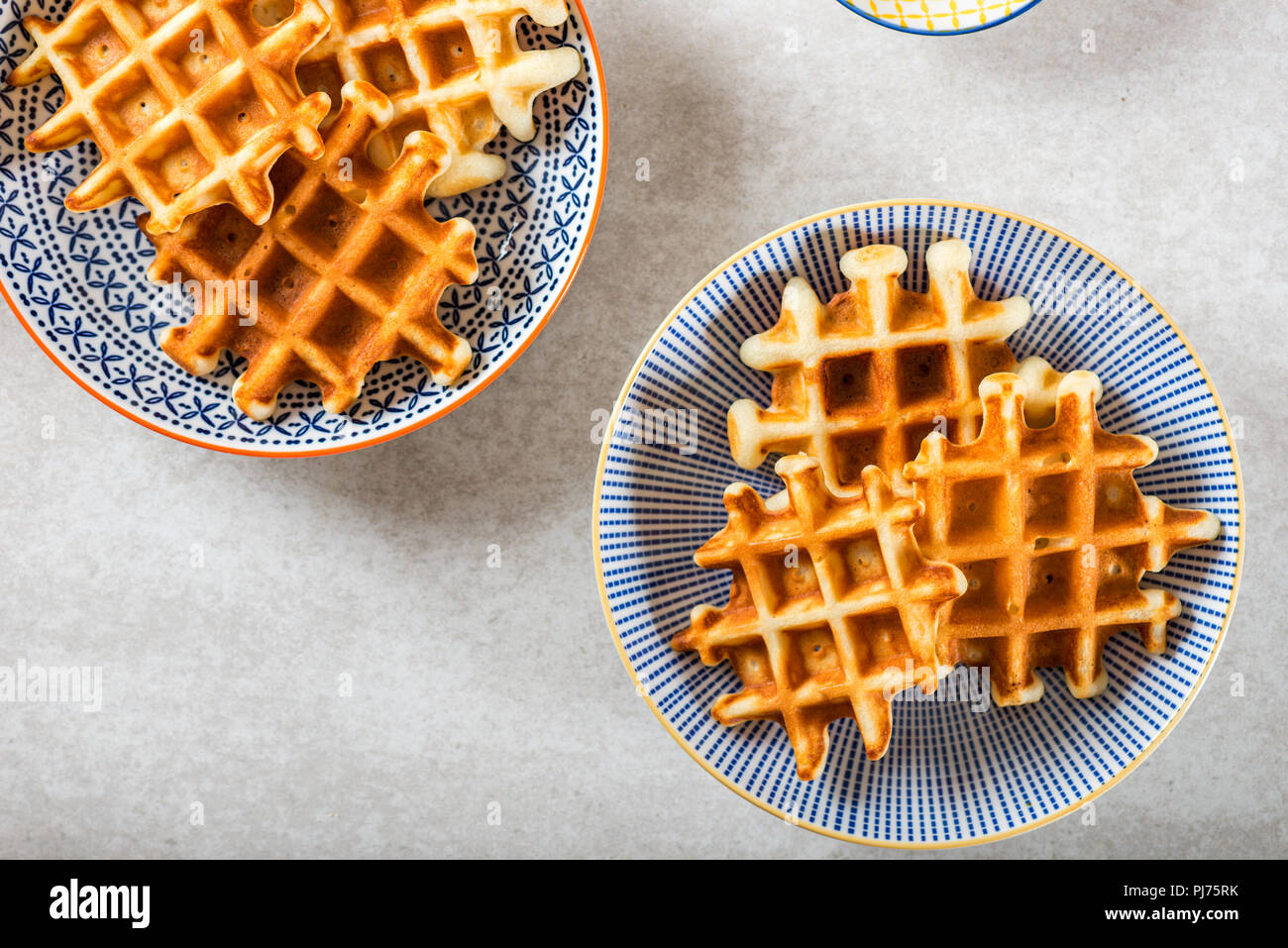 Traditional homemade belgian waffles on light background. Cosy family ...