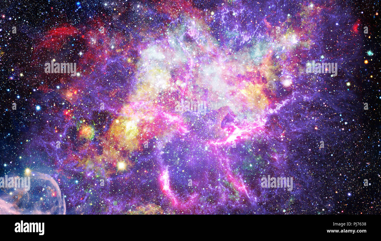 Colored clouds in nebula. Combined version of Hubble space telescope ...