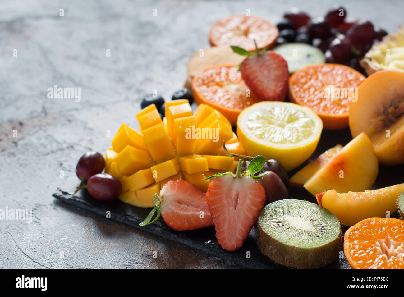Tropical sliced fruit platter hi-res stock photography and images - Alamy