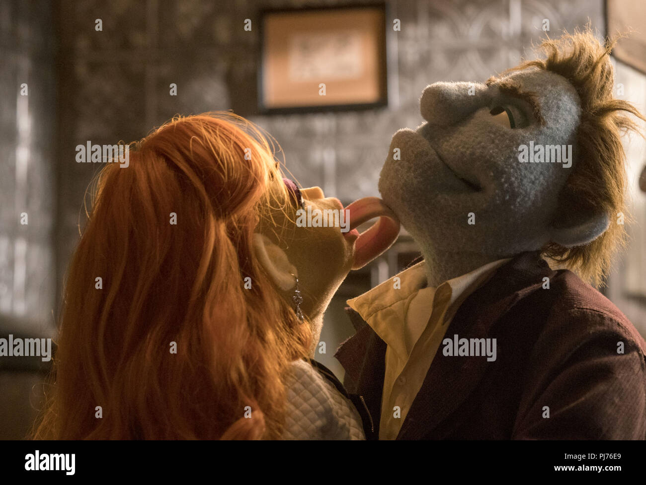 THE HAPPYTIME MURDERS, from left: Sandra (performed by Dorien Davies ...