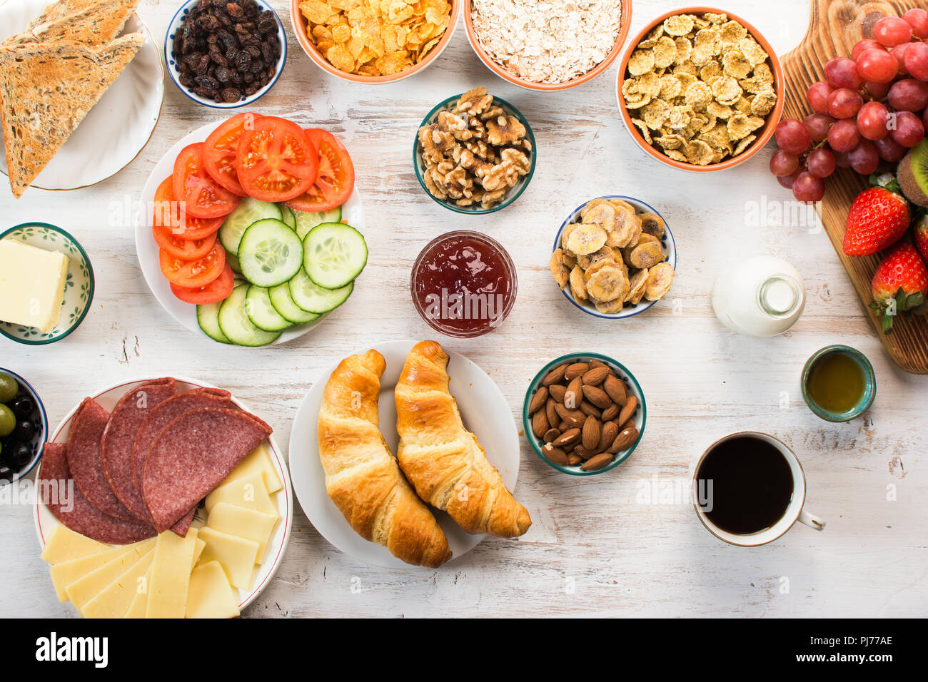 Top view of the healthy filling breakfast, ham, cheese, cereals, toast ...