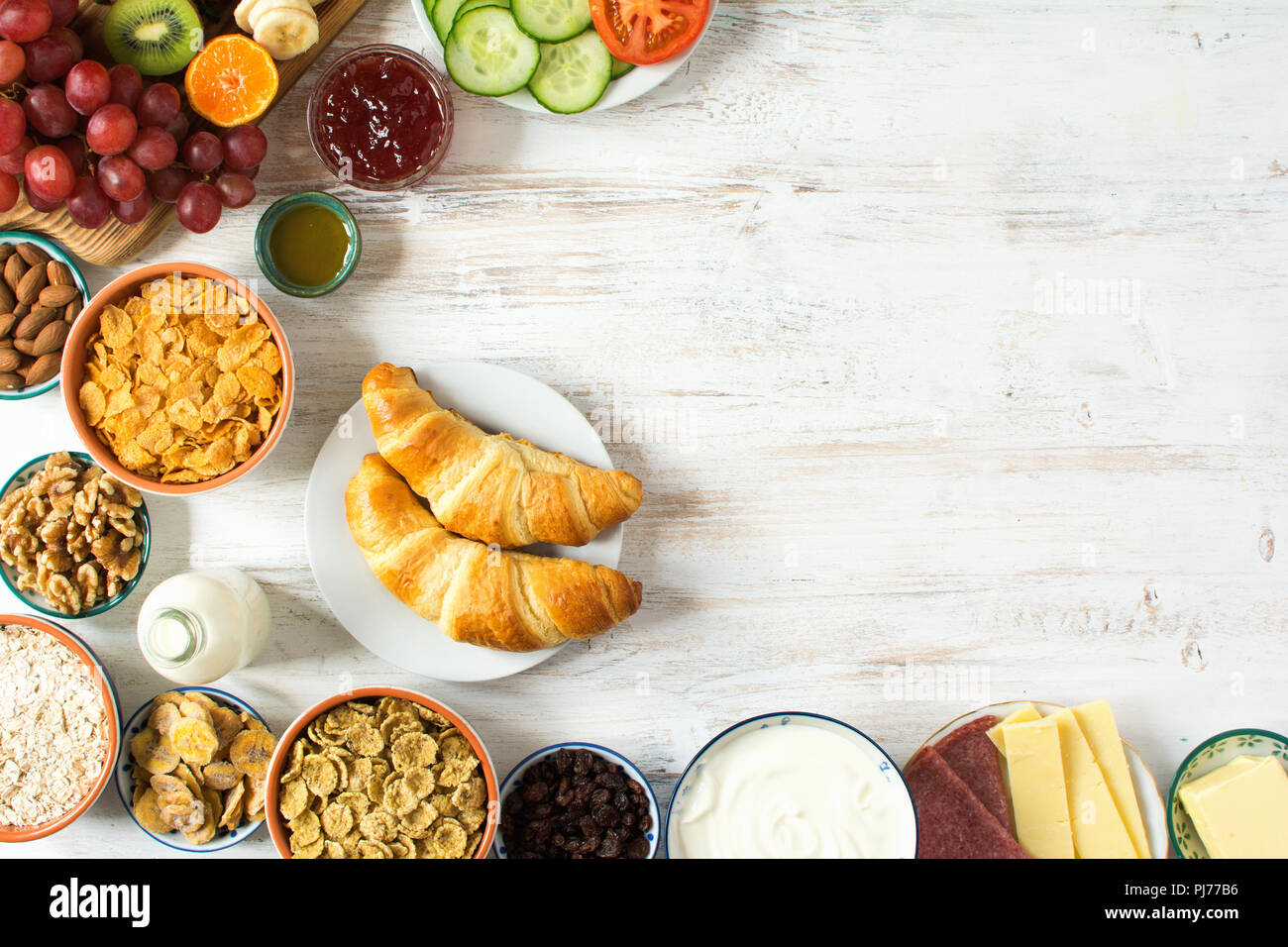 Top view of the healthy continental breakfast, ham, cheese, cereals ...