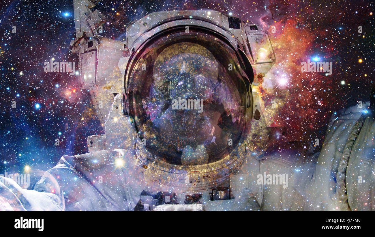 The Helix Nebula in deep space. Elements of this image furnished by ...