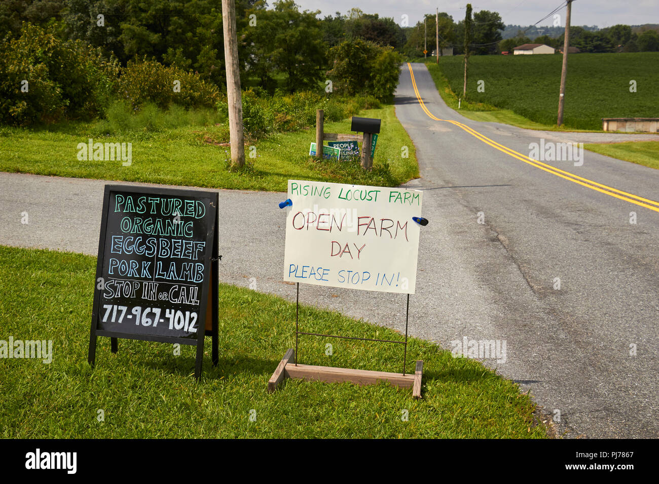 sign announcing Open Farm Day at Rising Locust Farm, a permaculture ...