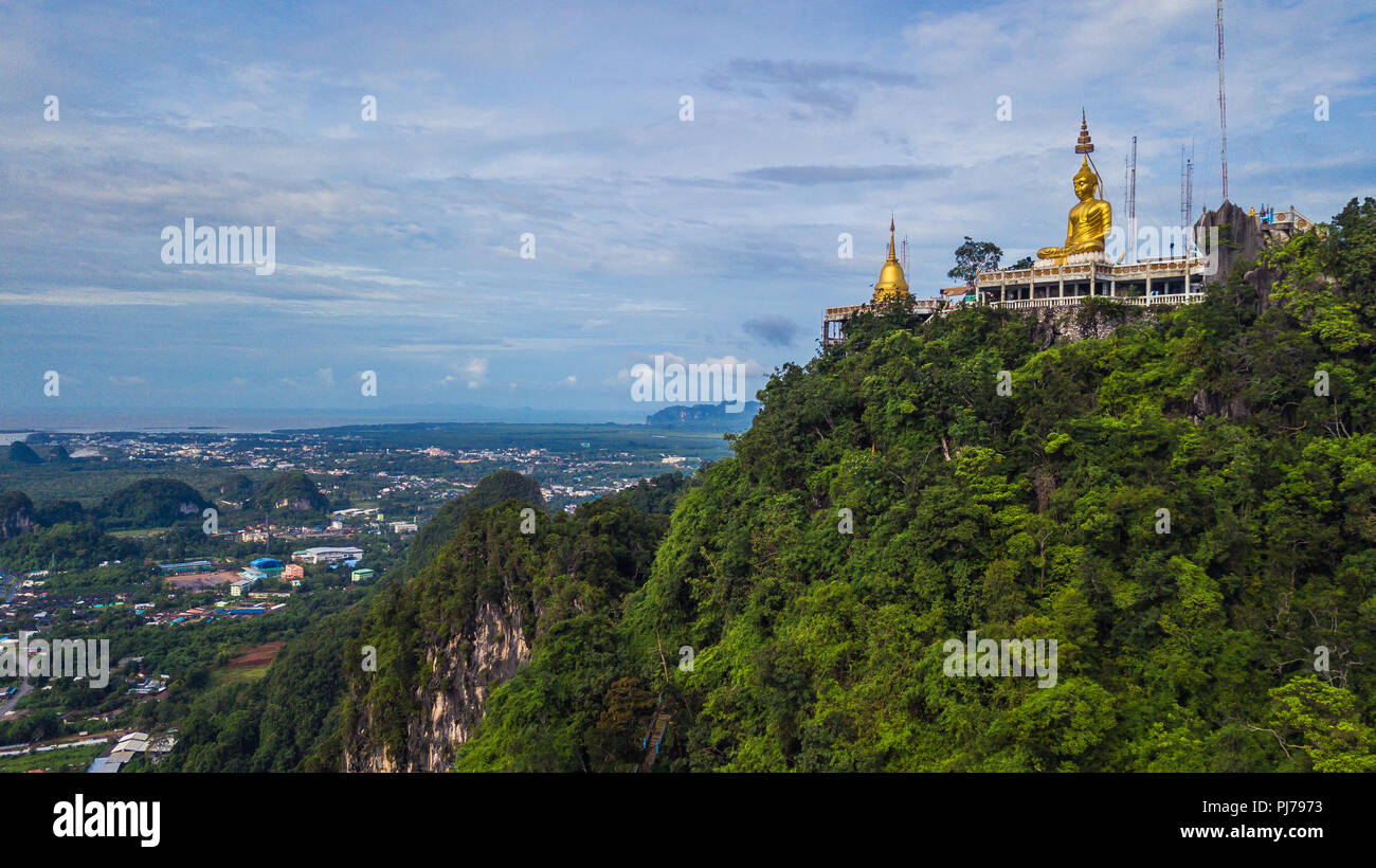 Buddha on the top Mountain of Wat Tham Seua (Tiger Cae) , Krabi ...