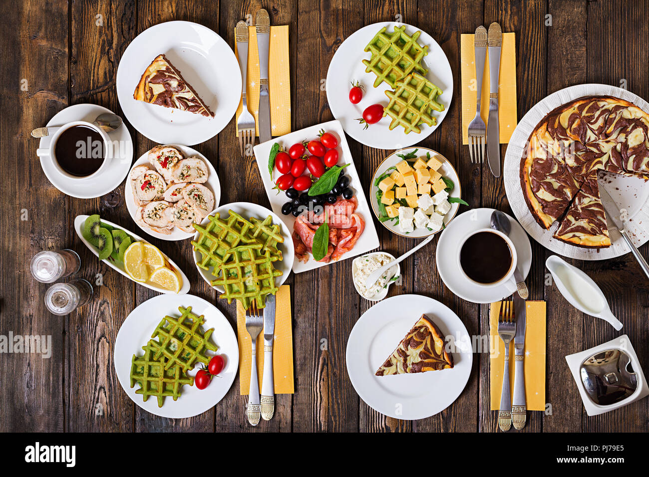 Breakfast food table. Festive brunch set, meal variety with spinach ...