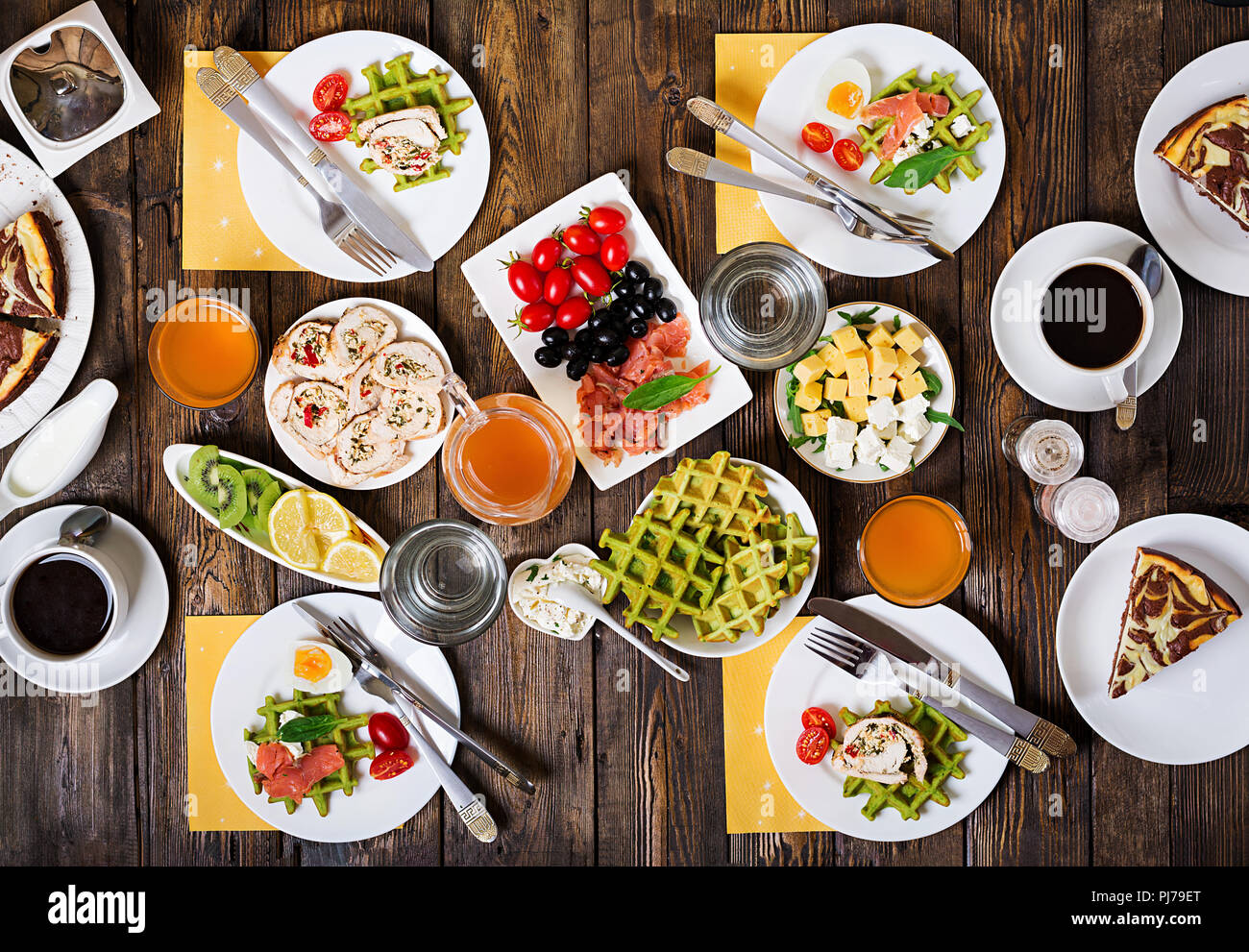Breakfast food table. Festive brunch set, meal variety with spinach ...