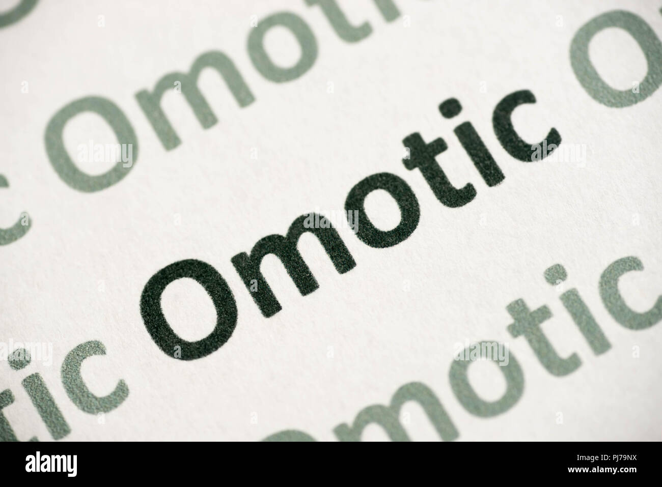 word Omotic language printed on white paper macro Stock Photo - Alamy