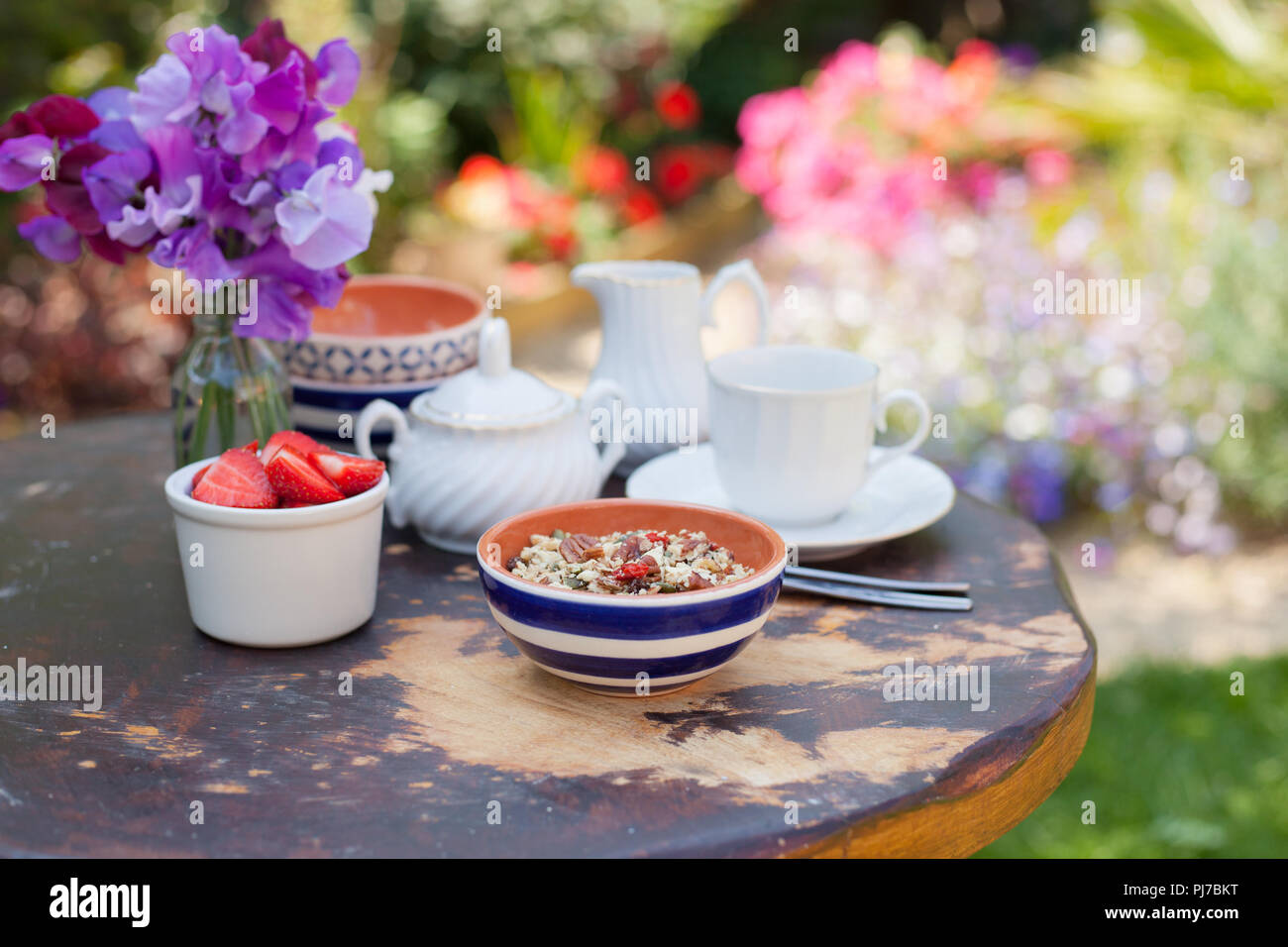 Breakfast in the garden: gluten, grain free cereals on the weathered ...