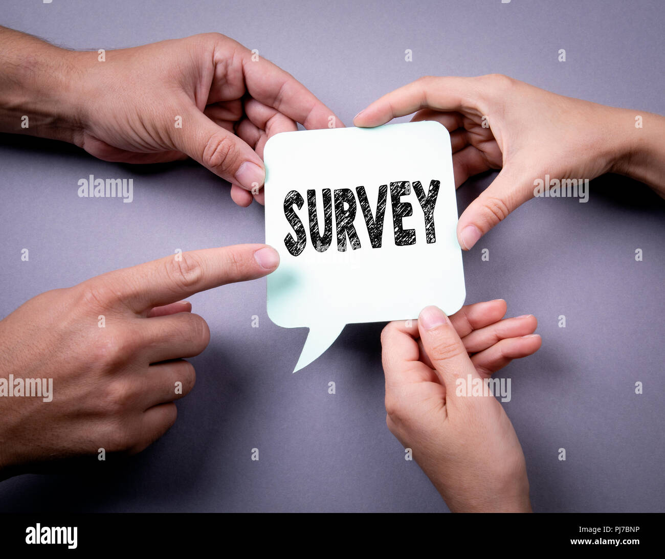 survey concept. Speech bubble on a gray background Stock Photo - Alamy
