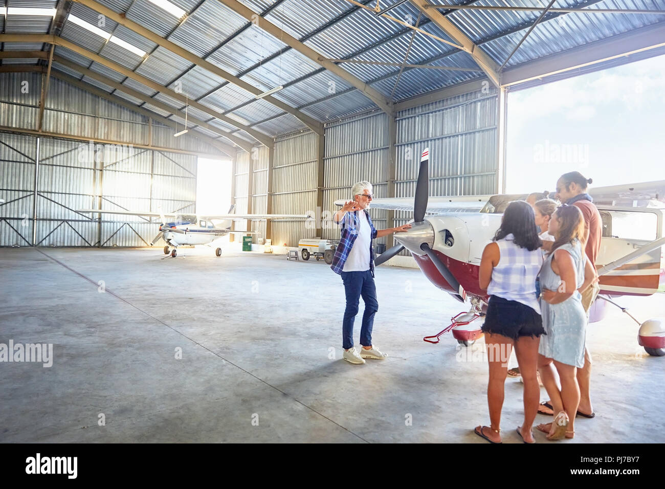 Airplane arms hi-res stock photography and images - Alamy