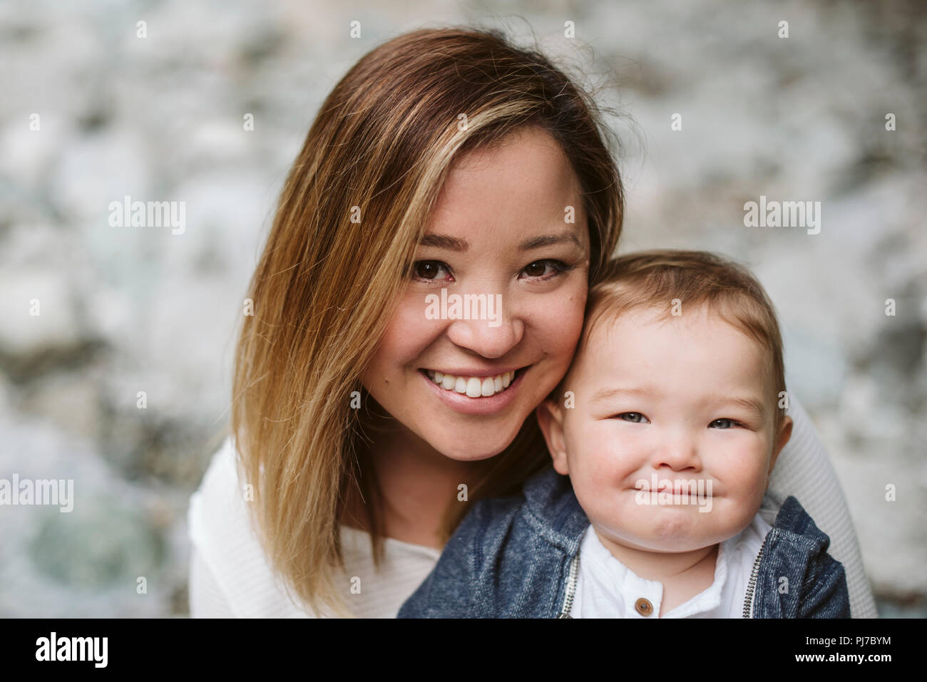 Portrait smiling mother and cute baby son Stock Photo - Alamy