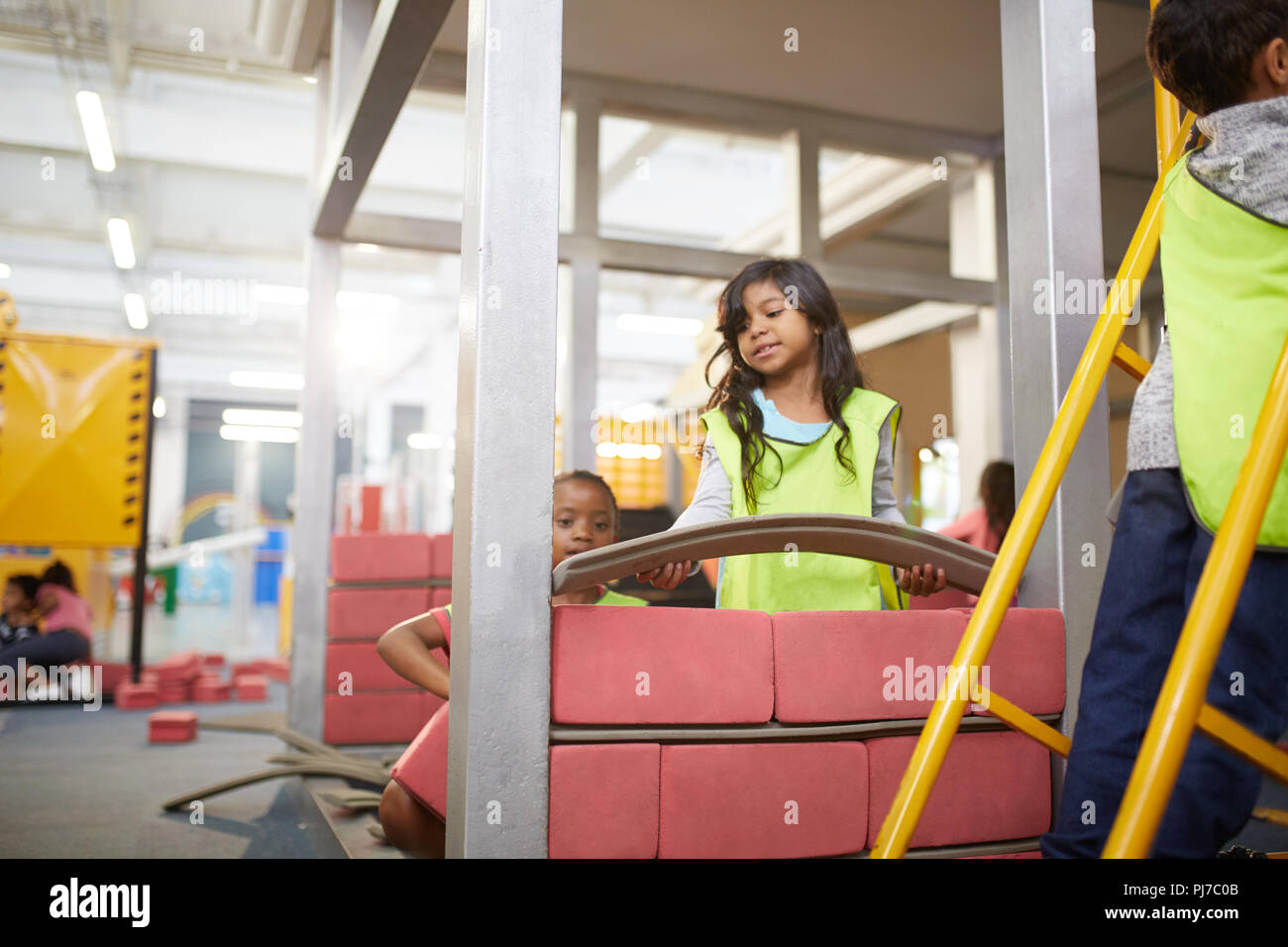 Kids playing at interactive construction exhibit in science center ...