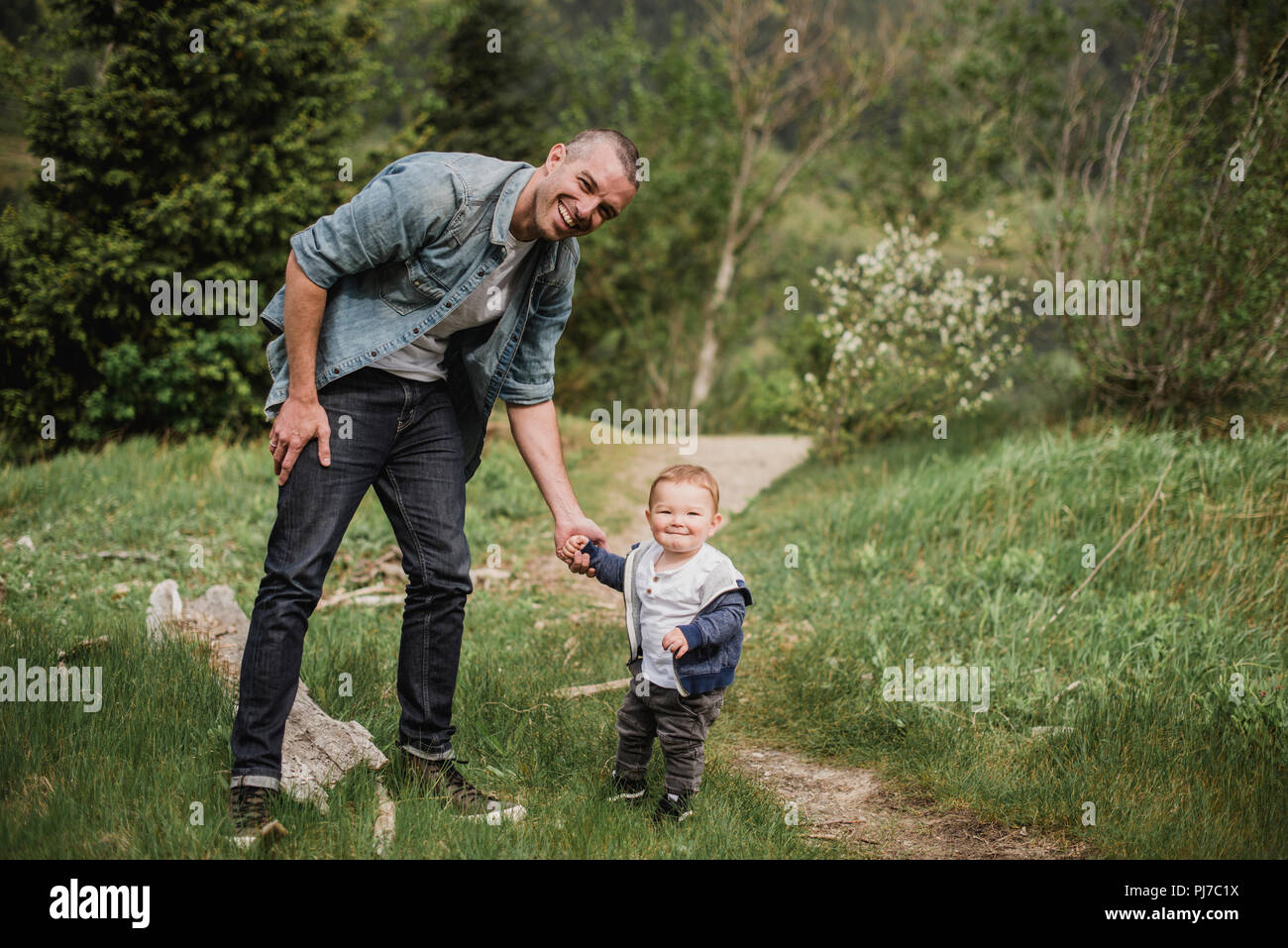 Father walking with his son hi-res stock photography and images - Alamy