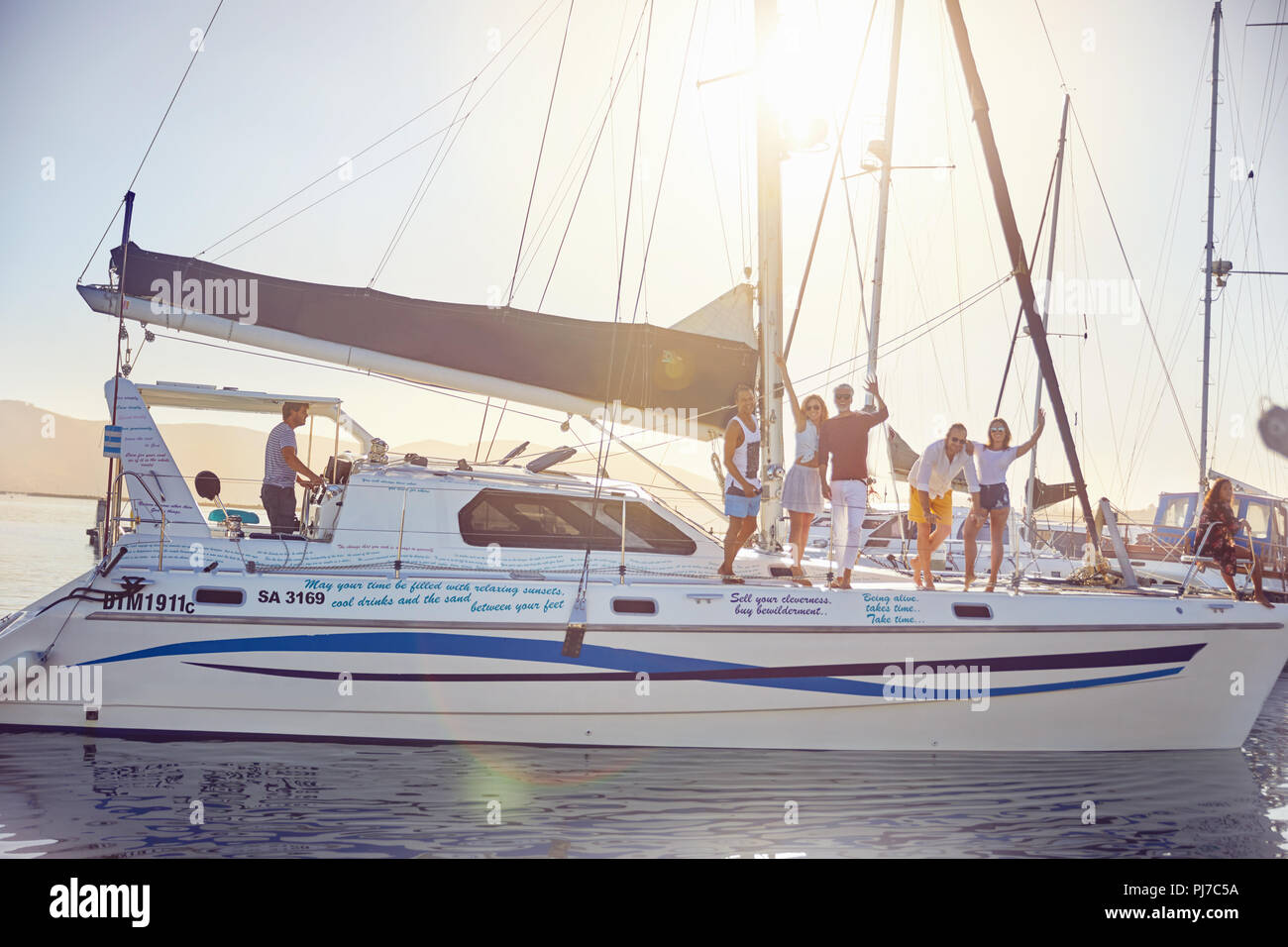 Man waving from a boat hi-res stock photography and images - Alamy