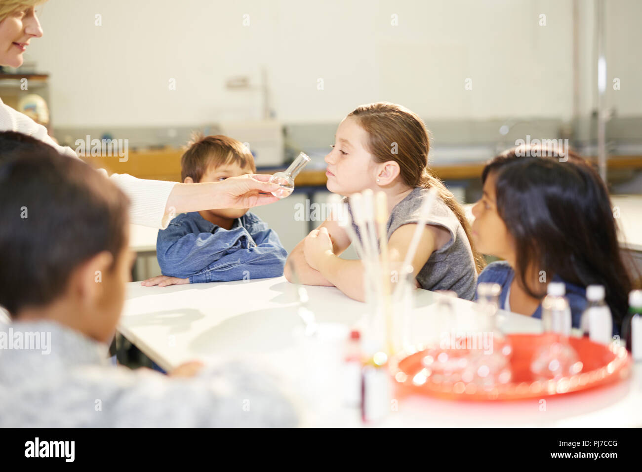 Kids smelling scents at interactive exhibit in science center Stock ...