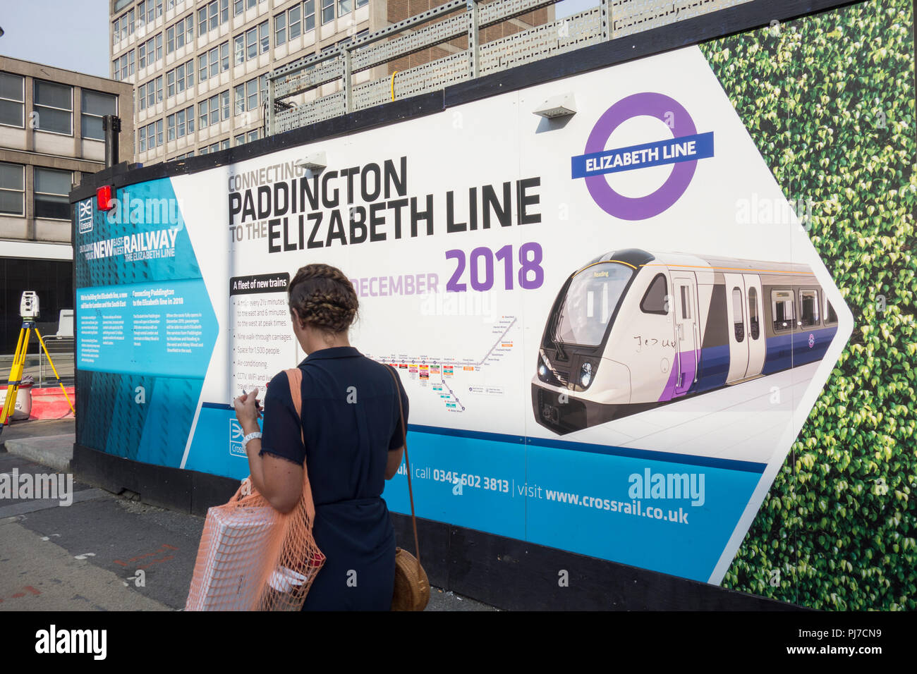 Paddington Elizabeth Line advertising and hoarding, Paddington, London ...