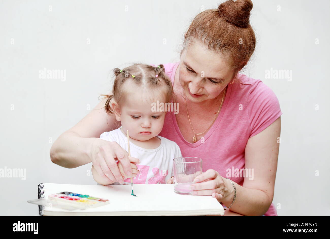 The girl is drawing Stock Photo - Alamy