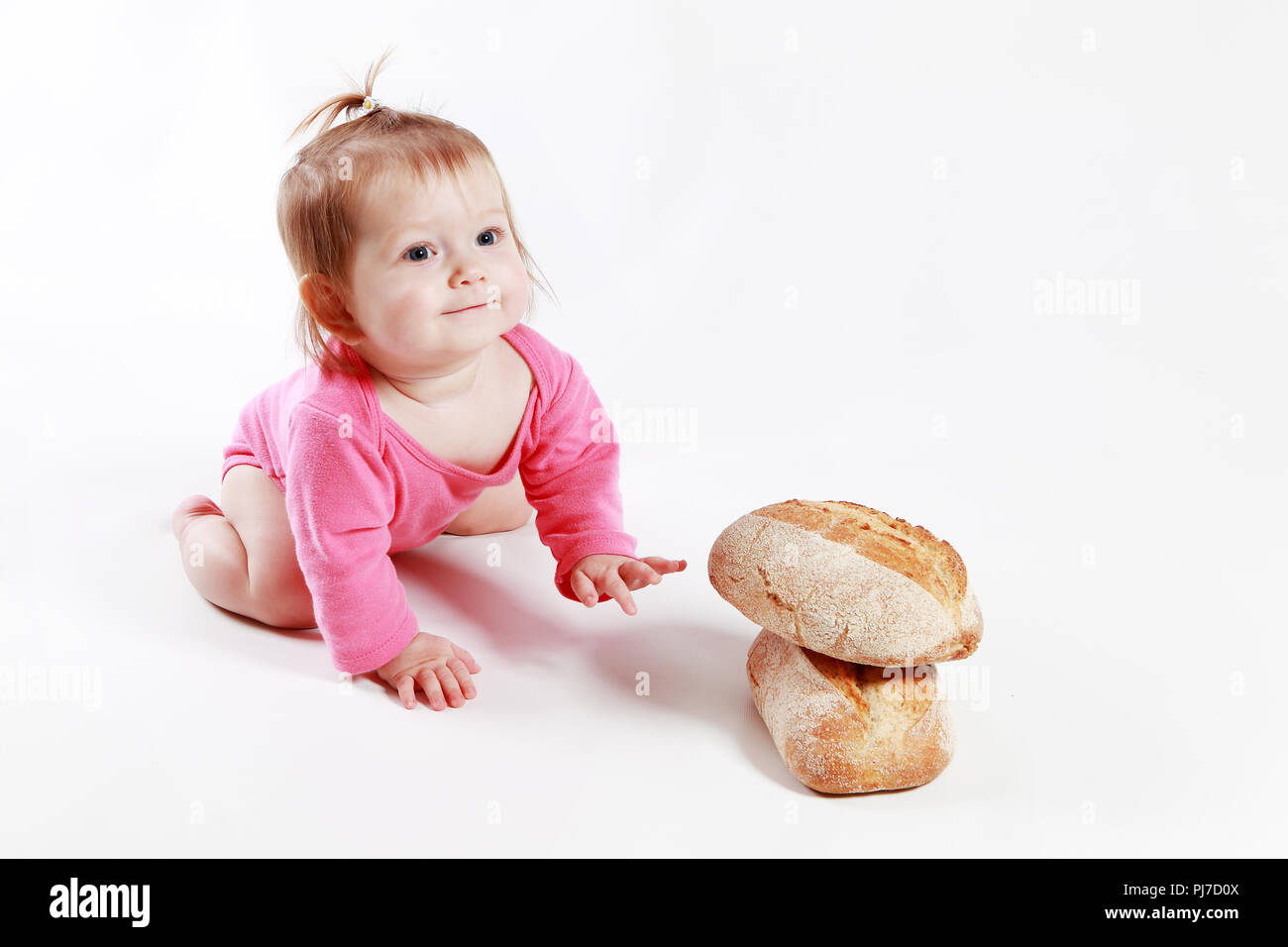 Little child with bread Stock Photo - Alamy