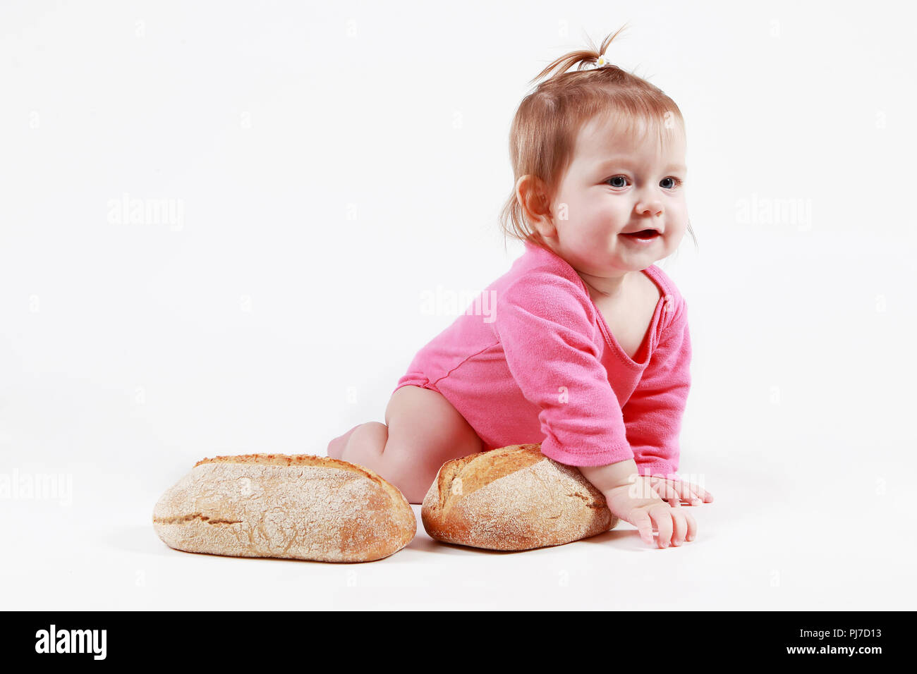 Little child with bread Stock Photo - Alamy