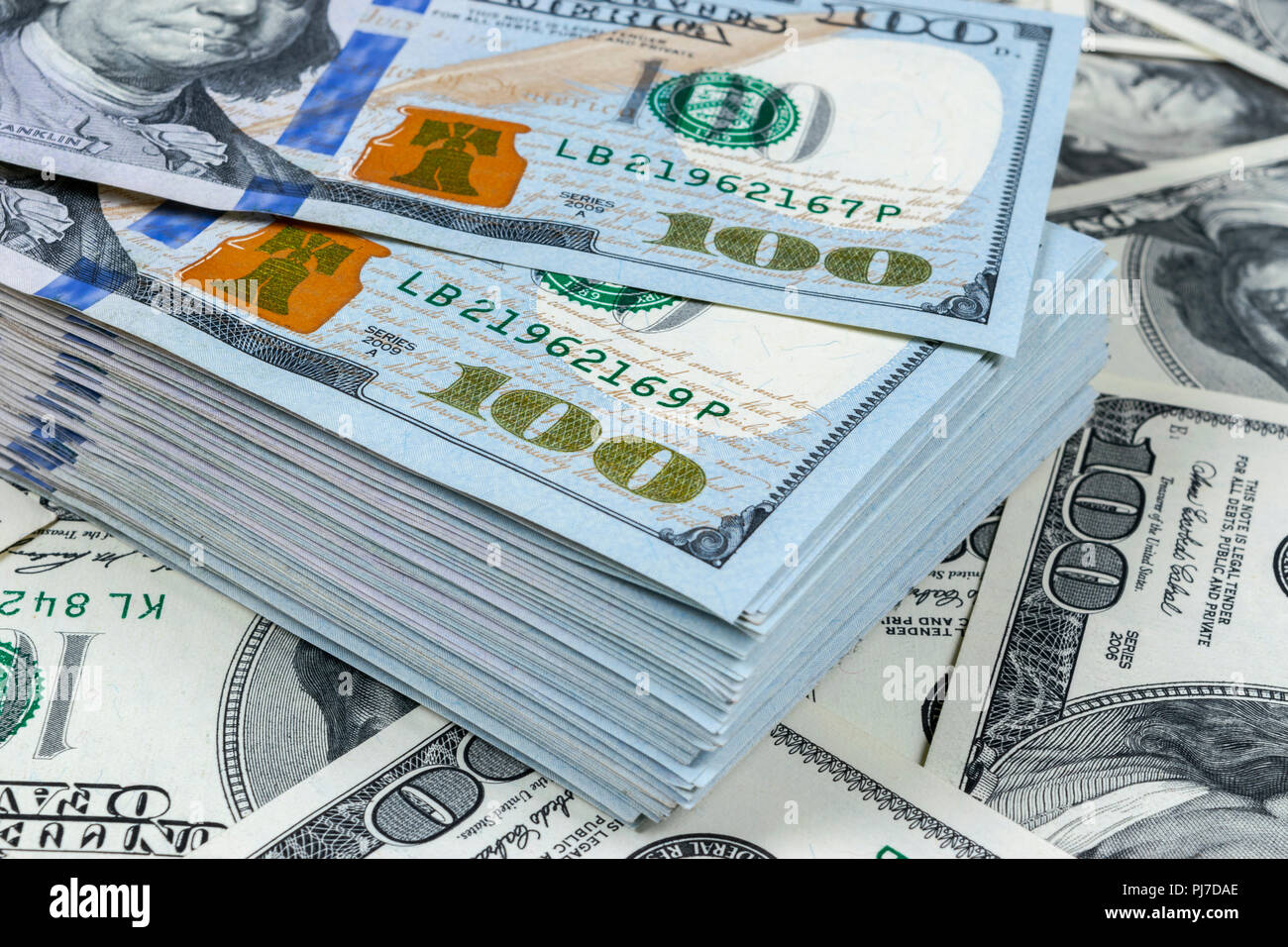 Stack of one hundred dollar bills. Stack of cash money in hundred ...
