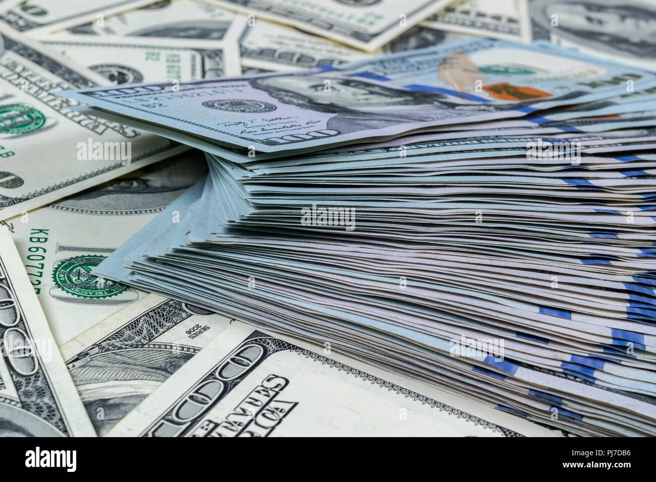 Stack of one hundred dollar bills. Stack of cash money in hundred ...