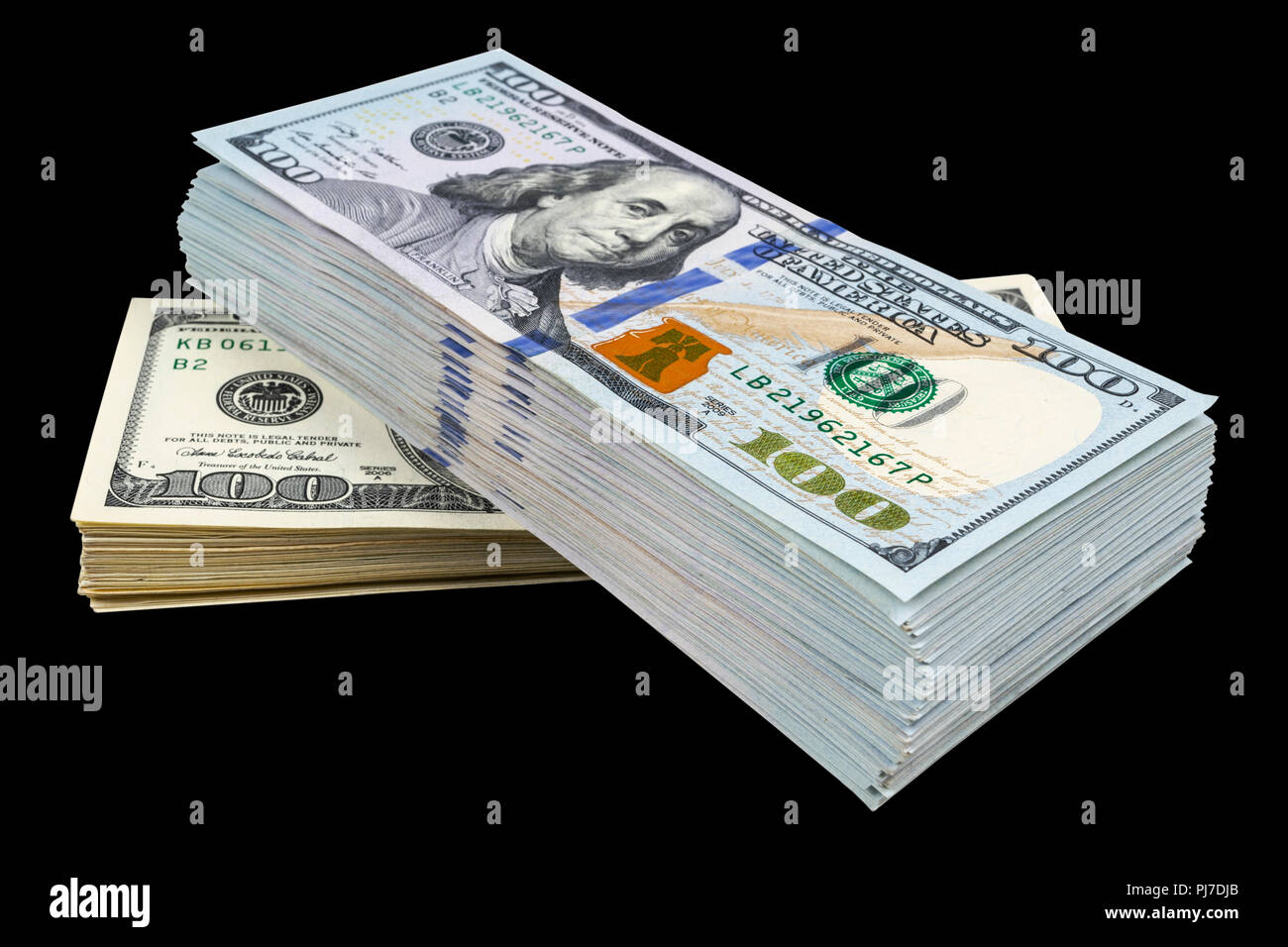 Stack of one hundred dollar bills isolated on black background. Stack ...