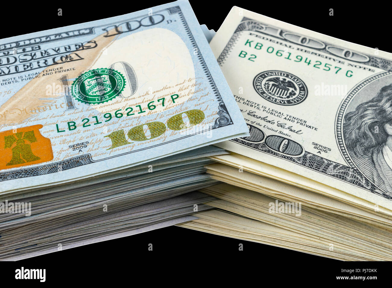 Stack of one hundred dollar bills isolated on black background. Stack ...
