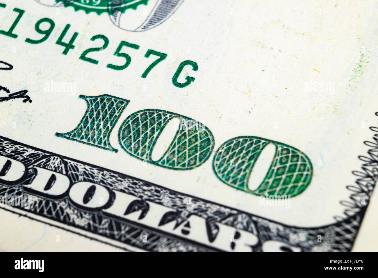 Macro shot image of the corner of a 100 dollar bill banknotes. Concept ...