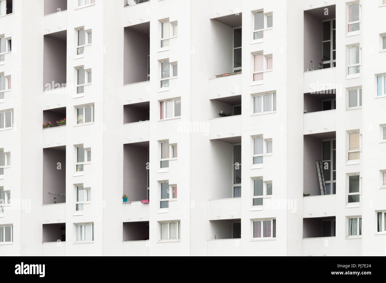 Minimalist architecture. Residential tower with bright light and white ...