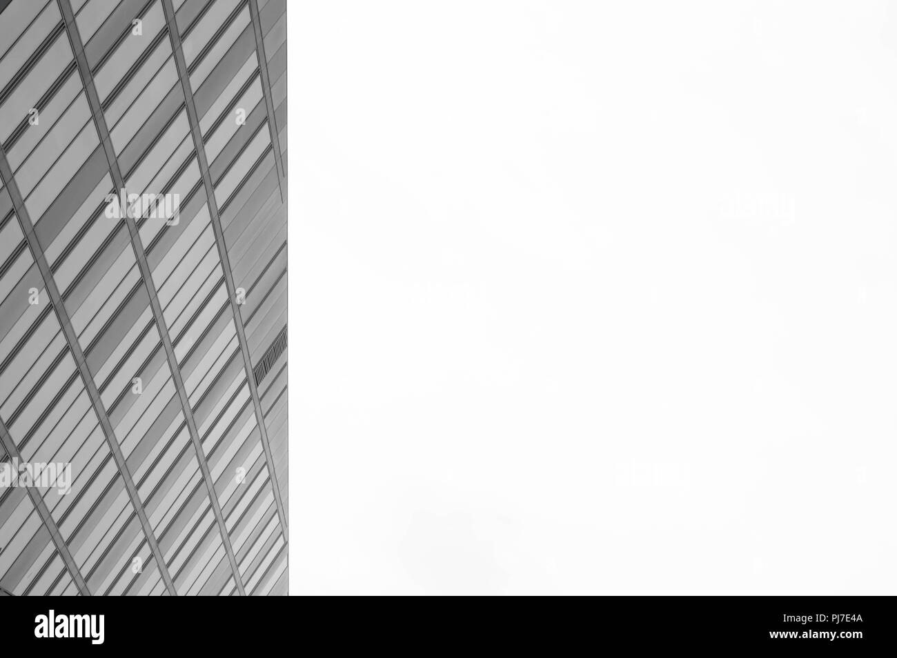 Stunning architectural diagonal shape building with blank space. Black ...