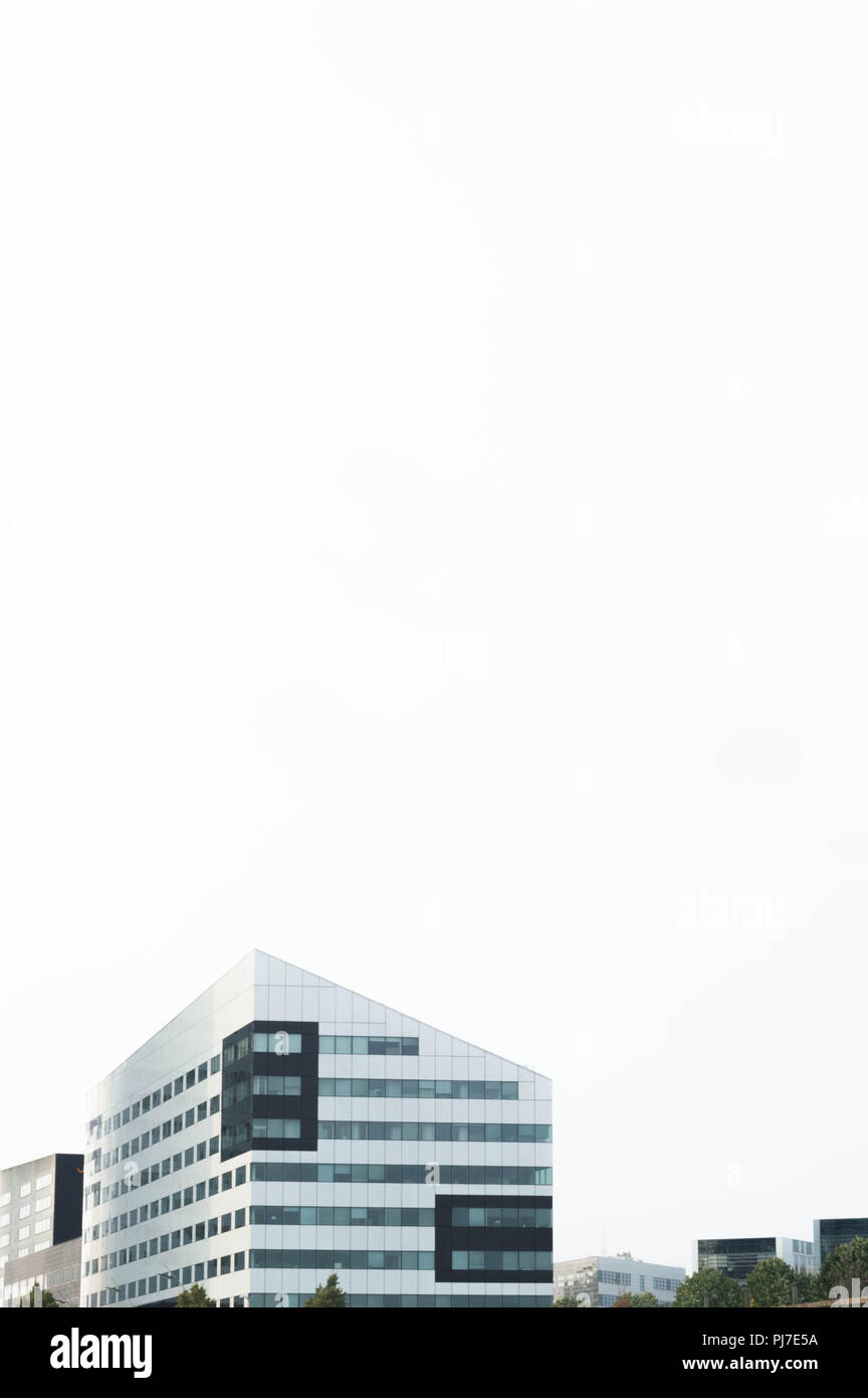 Business building with glass windows seen in the distance Stock Photo ...
