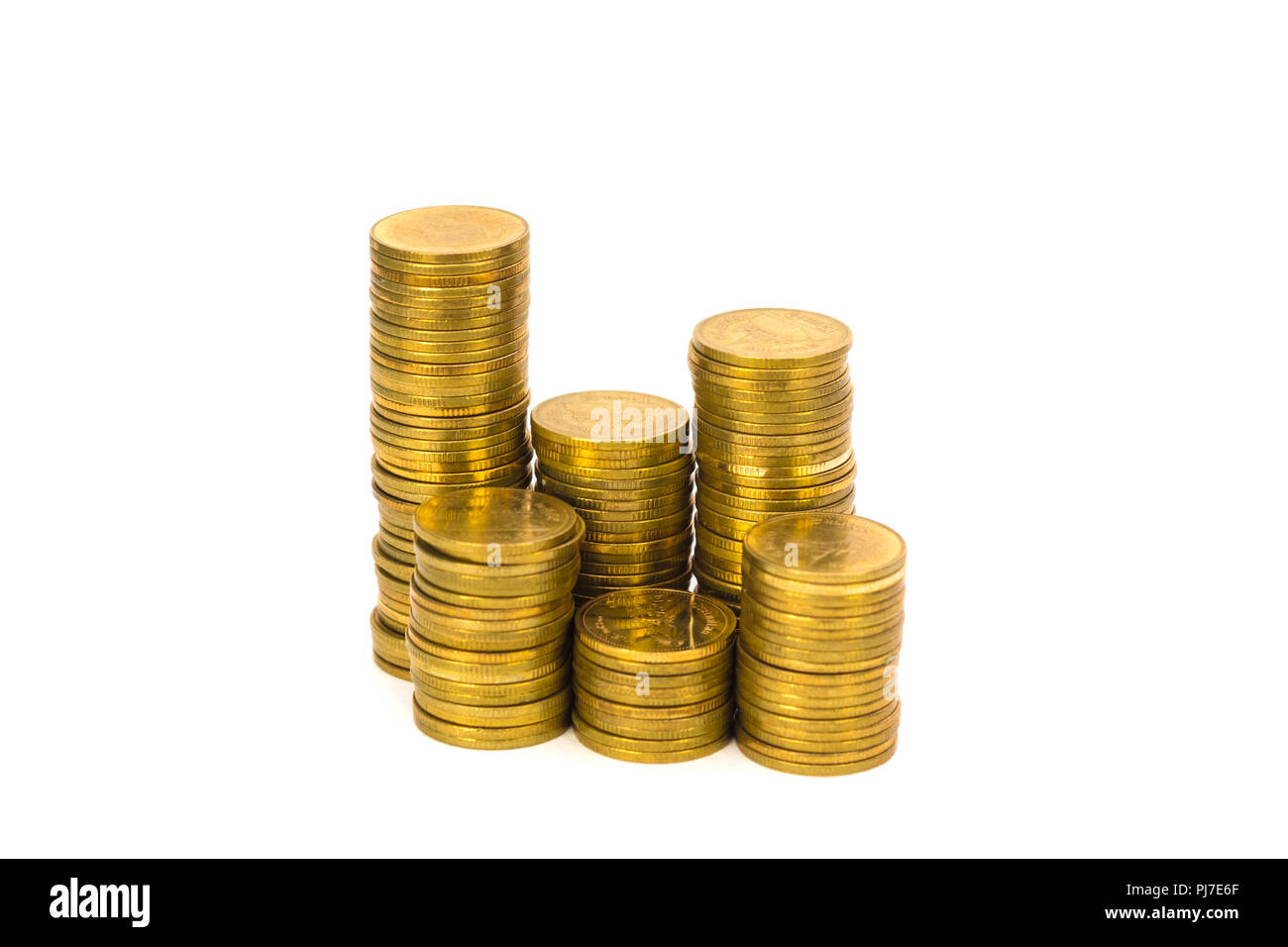 Columns of coins, piles of coins on white background, business and ...