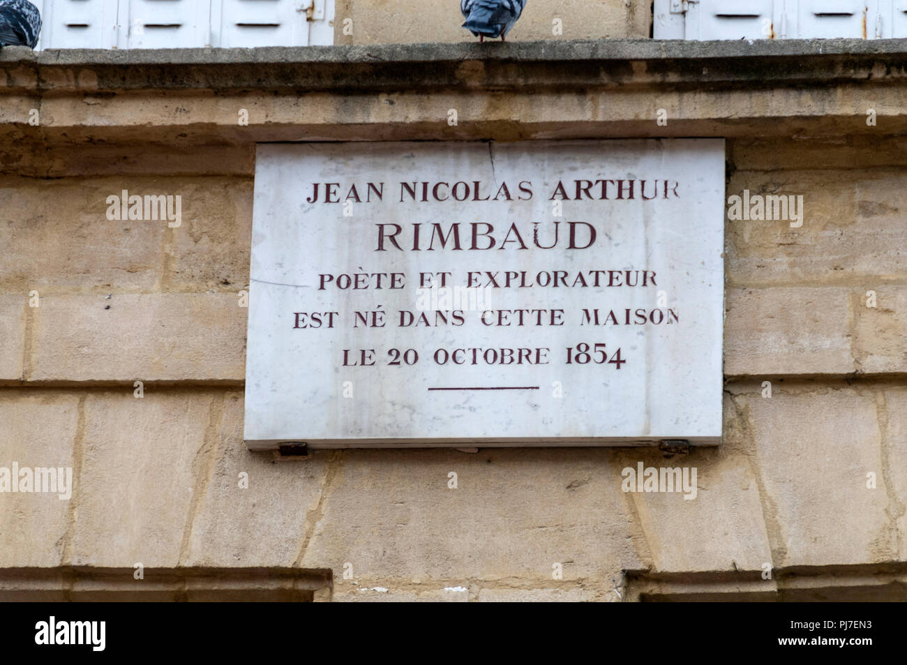 A wall plaque of the birthplace of poet. Jean Rimbaud in Charleville ...