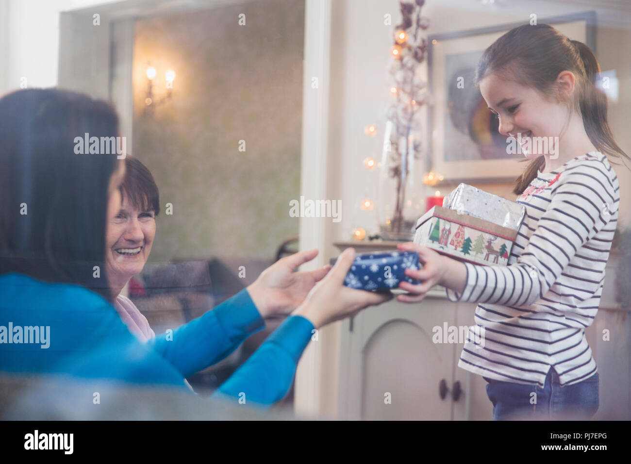Passing out gifts hi-res stock photography and images - Alamy